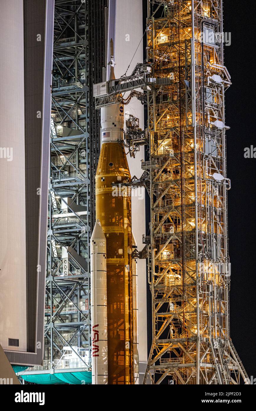 NASA’s Space Launch System sits at the Vehicle Assembly Building at the ...