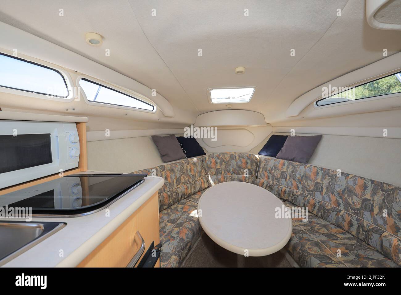 Sleeping berth interior on private motor yacht Stock Photo - Alamy