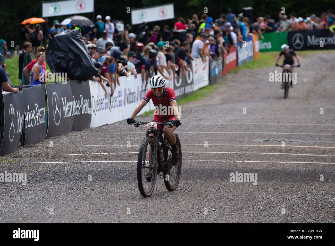 August 07, 2022: Lucie Urruty of France (55) crosses the finish line of ...
