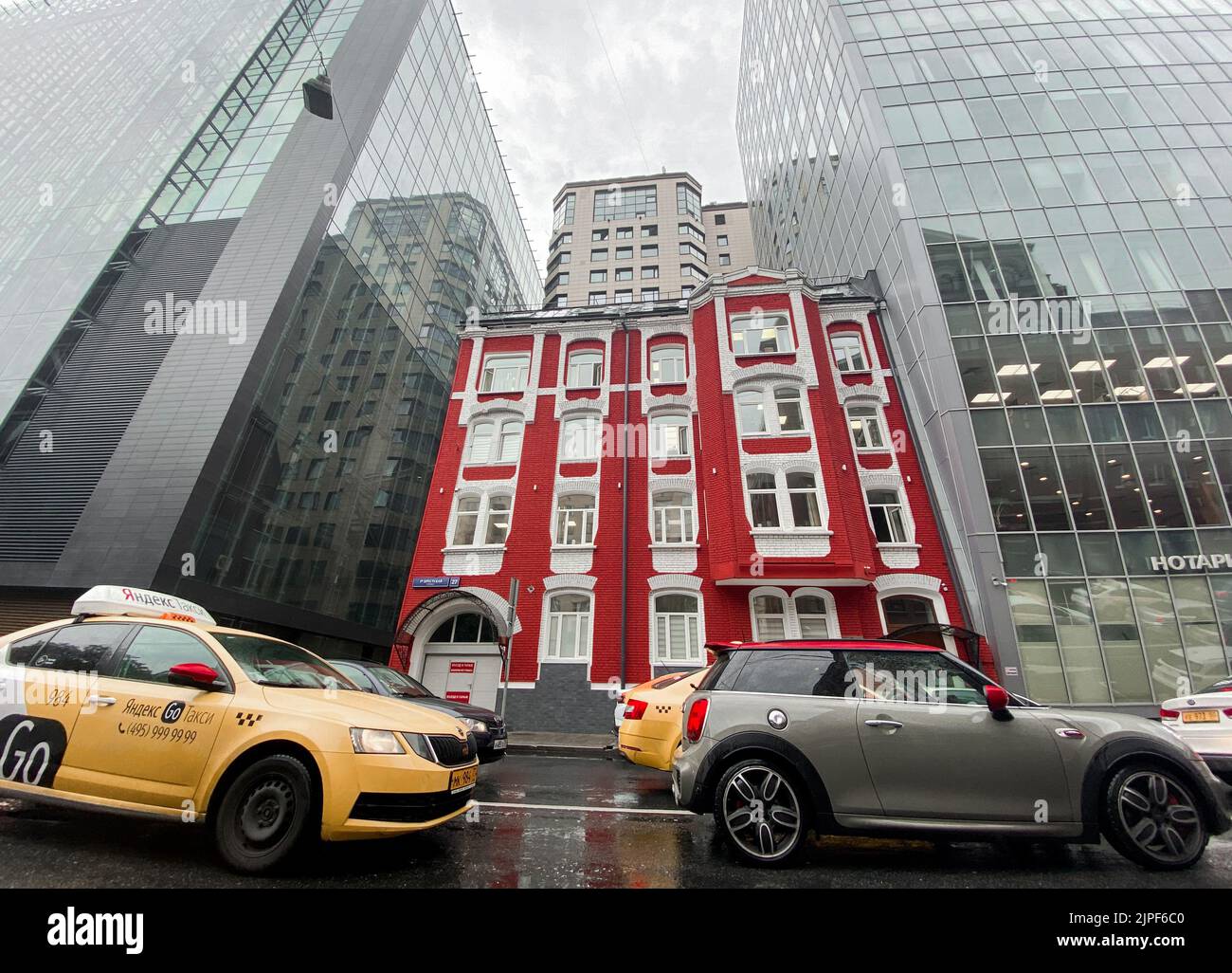 Moscow, Russia, August 2021: An old little red brick house stands ...