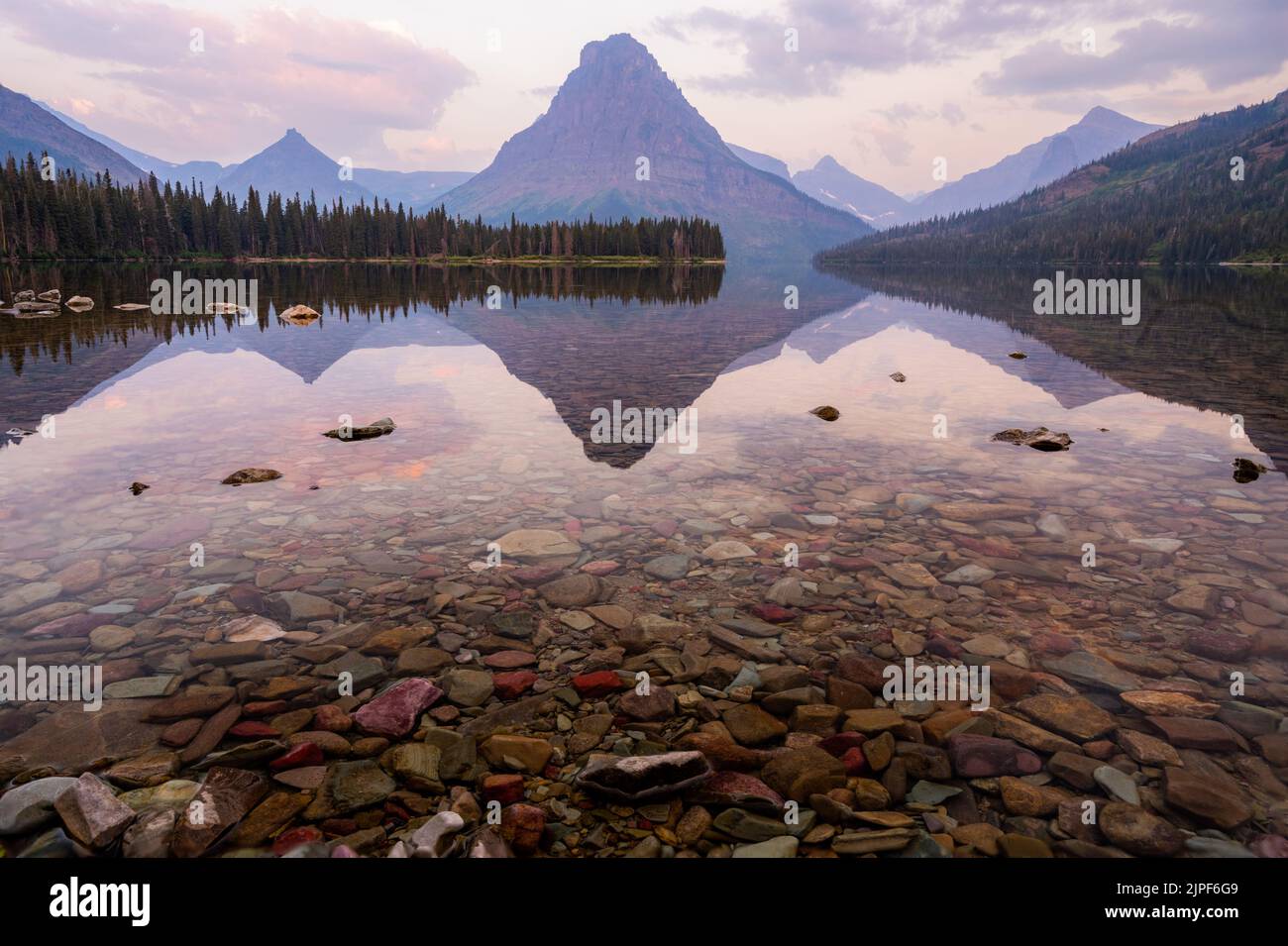 Multicolored Rocks Underneath Shallow Waters of Two Medicine Lake in ...