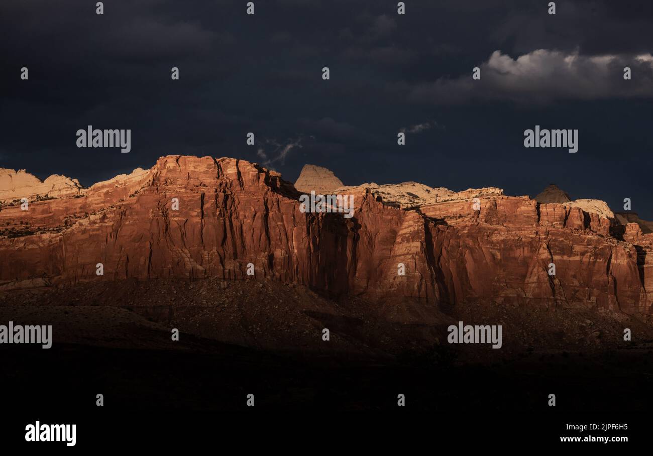 Ominous Dark Clouds Over the Last Light on Cliffs in Capitol Reef ...