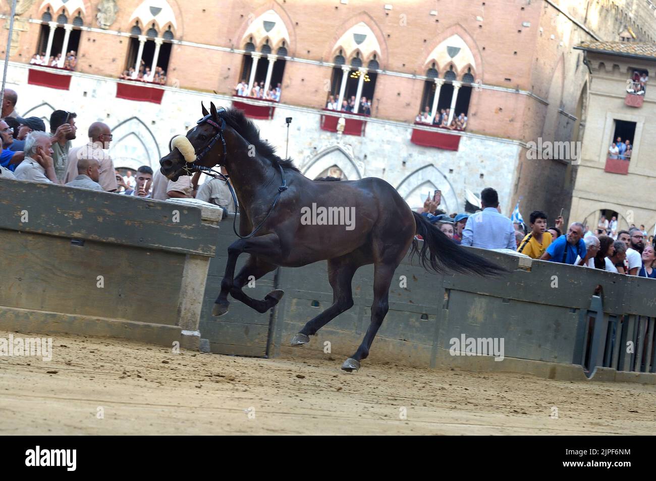 Jockeys compete at the historical horse race Palio di Siena 2022 on ...