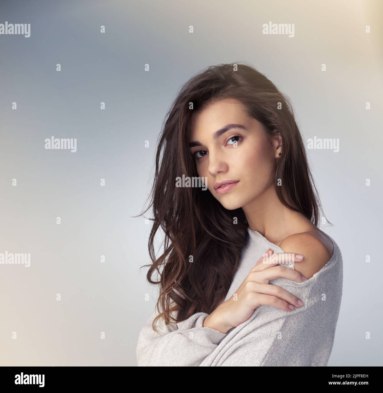 Confidence is the key to being beautiful. Studio shot of a beautiful ...