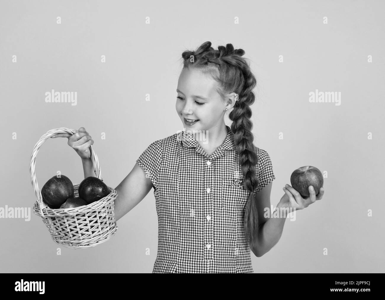 teen girl carry apples in basket. autumn harvest. spring season fruits ...