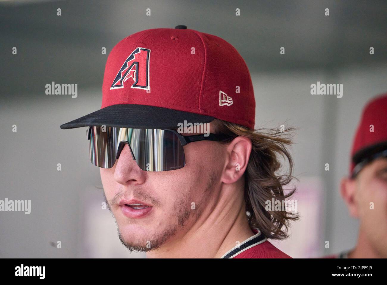 August 14 2022: Arizona left fielder Jake McCarthy [30) in the dugout ...