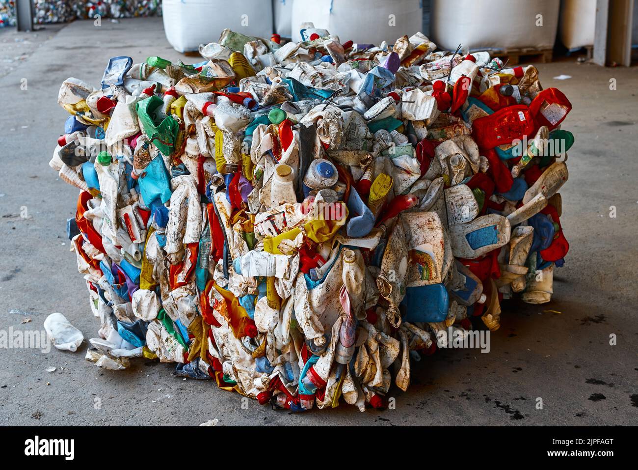 Block of pressed plastic bags at waste recycling plant Stock Photo - Alamy