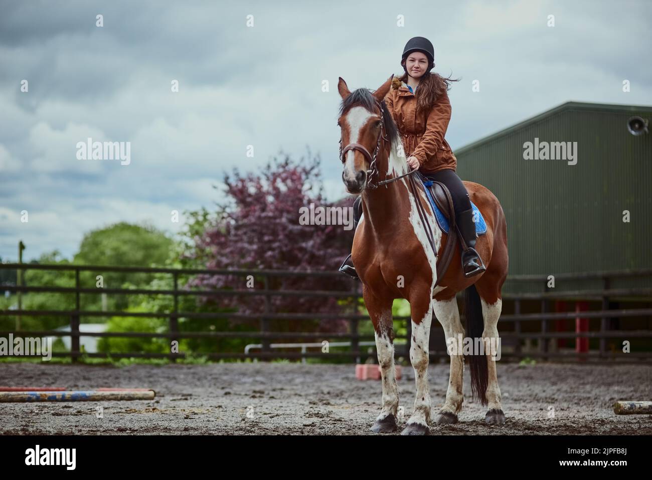 Every girls dream, riding a pony. a teenage girl riding her pony on a ...