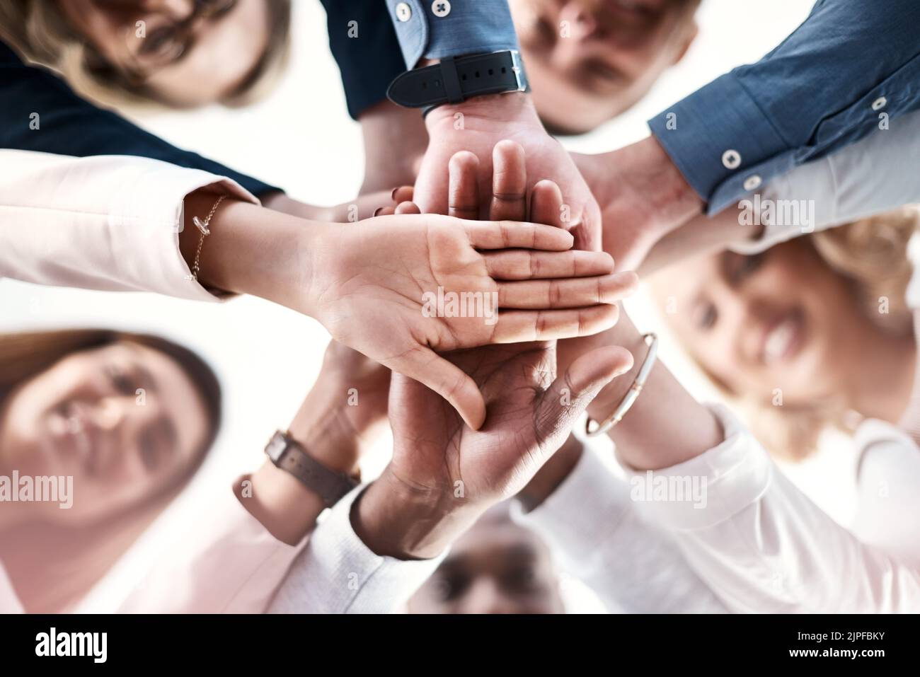 Were always here to motivate each other. Low angle portrait of a group ...