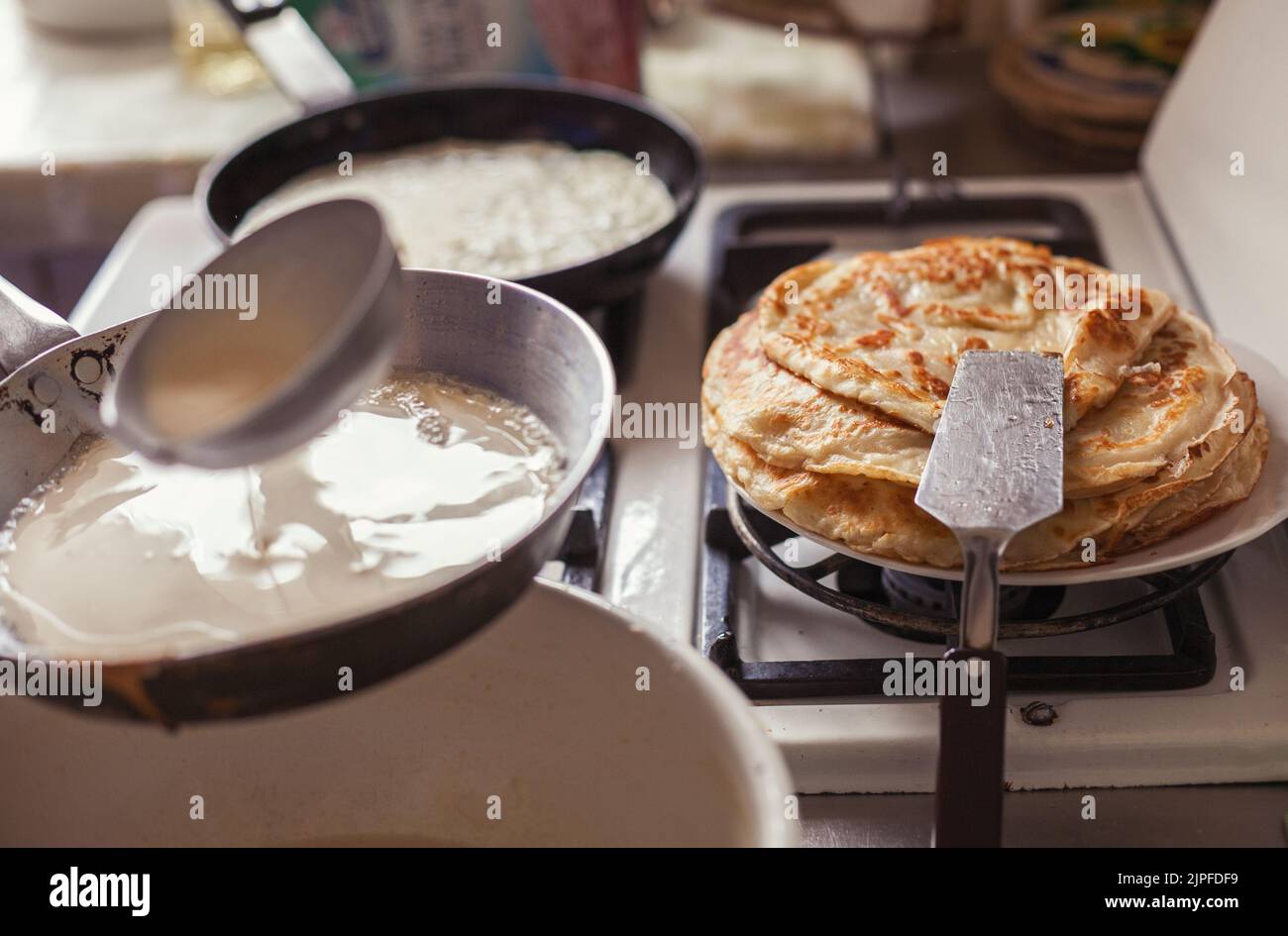 Preparation of pancakes hi-res stock photography and images - Alamy