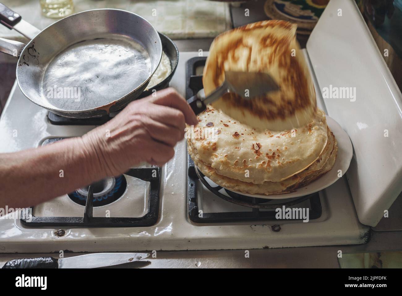 Grandmother cooking pan hi-res stock photography and images - Alamy