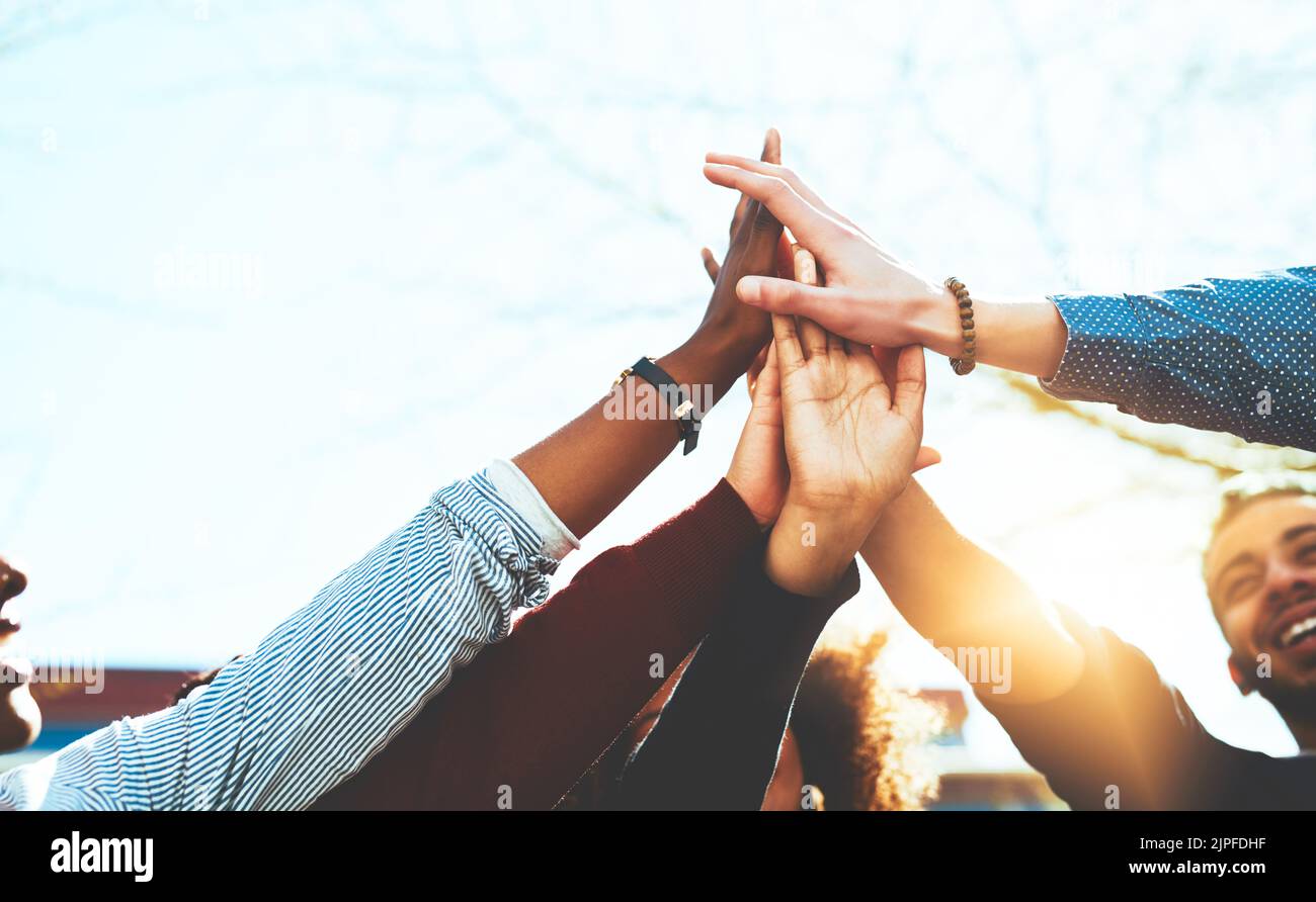 Were the best. an unrecognizable group of college friends high fiving ...