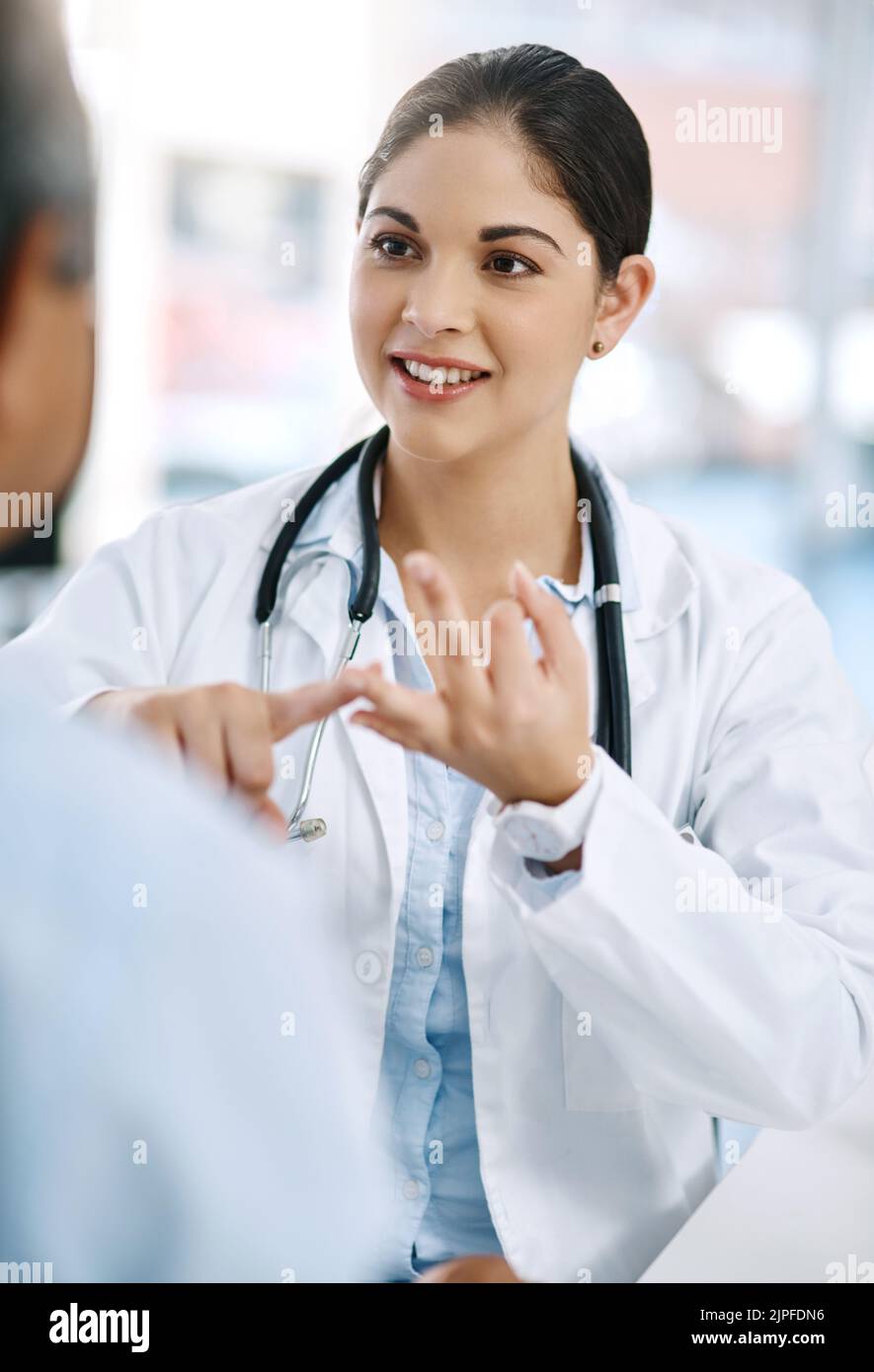 Follow my advice and youll be healthy again. a young female doctor ...