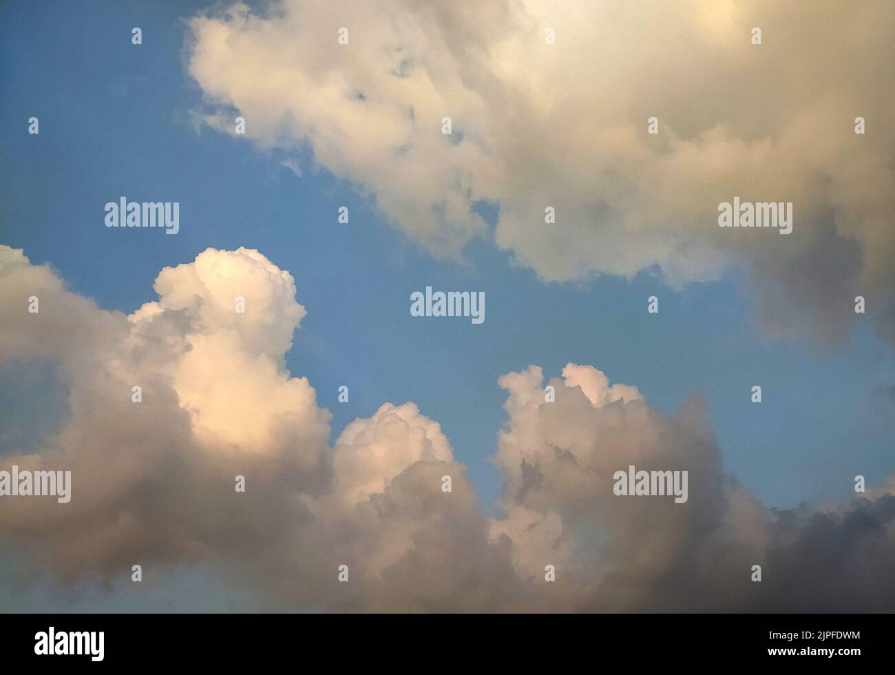 blue sky with colorful clouds in sunny summer afternoon Stock Photo - Alamy