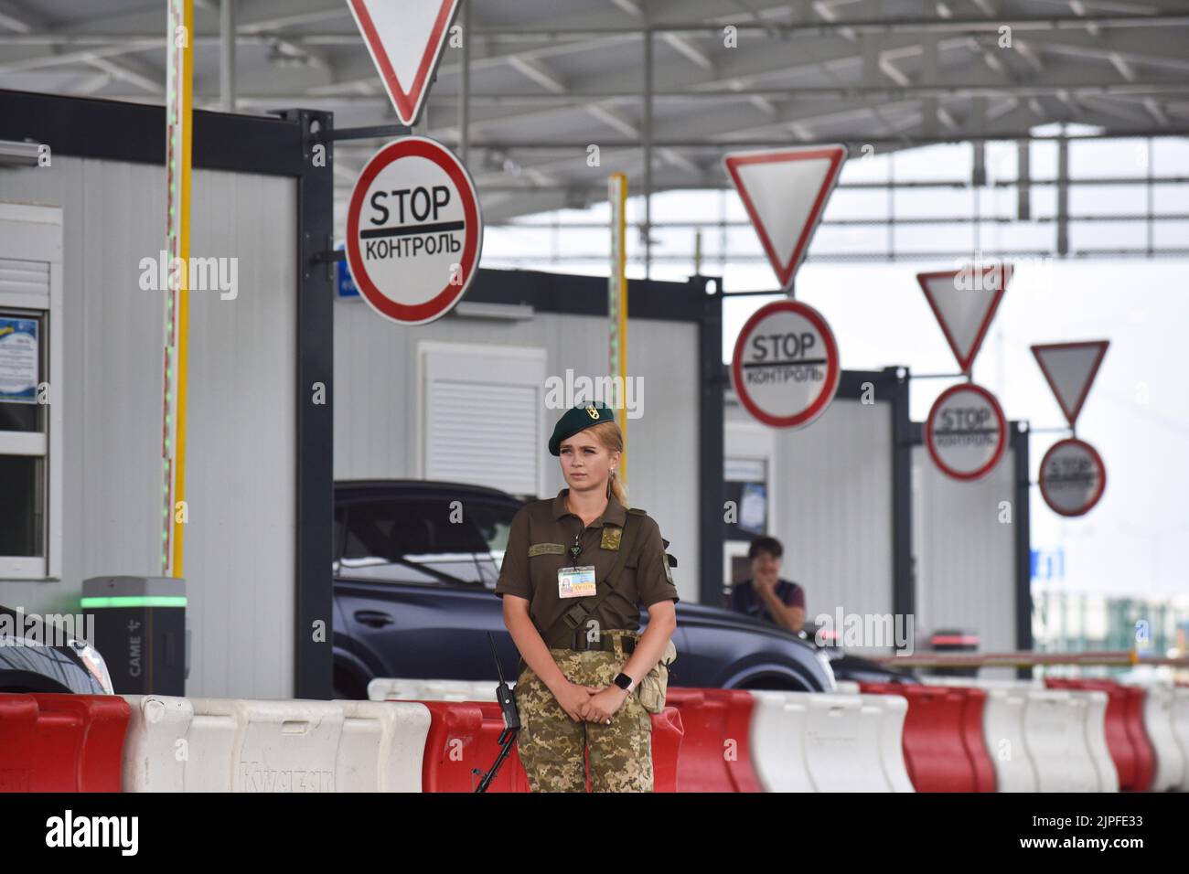 A border guard at the reconstructed checkpoint on the Ukrainian-Polish ...
