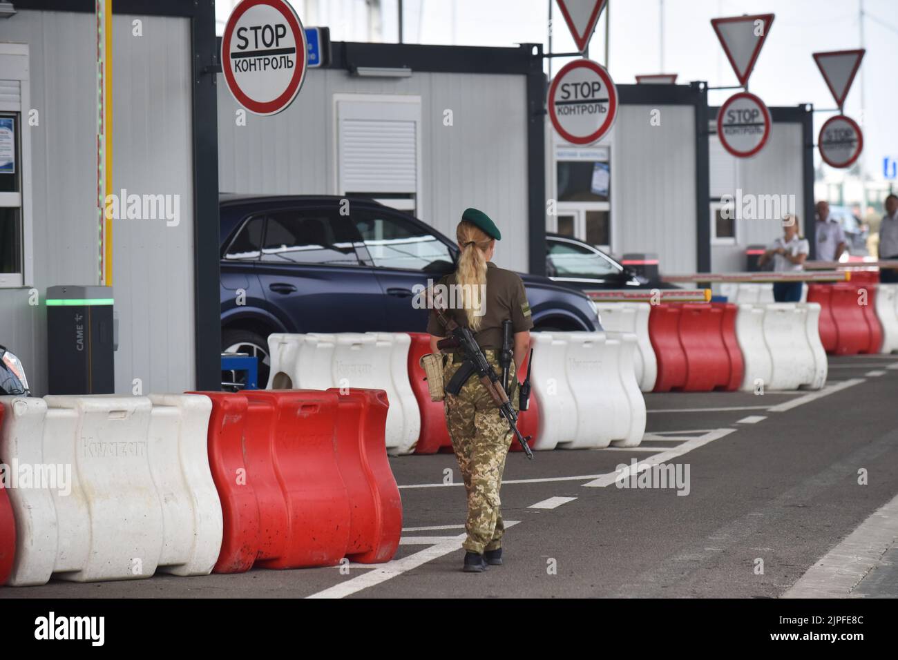 A border guard at the reconstructed checkpoint on the Ukrainian-Polish ...