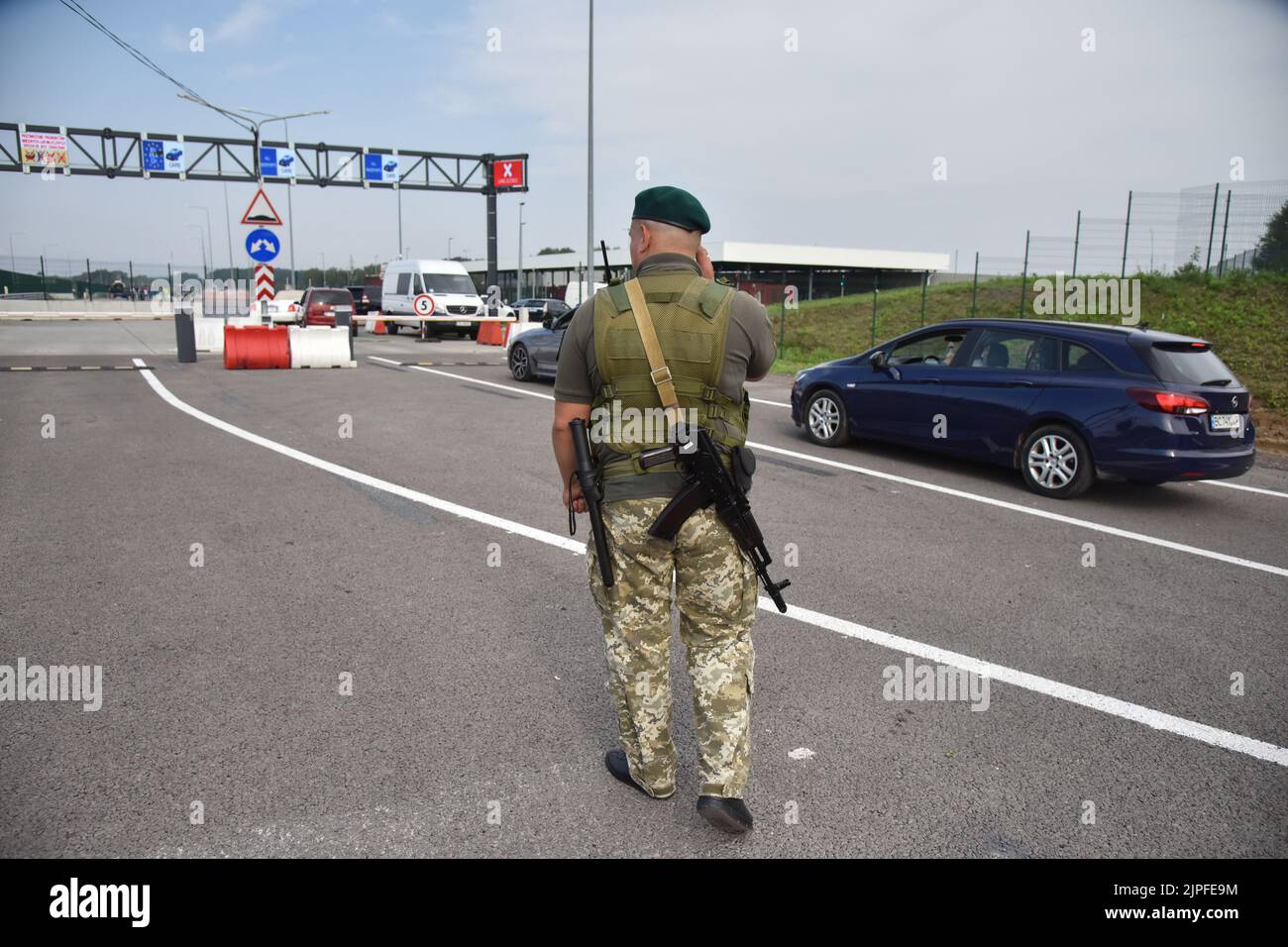 A border guard at the reconstructed checkpoint on the Ukrainian-Polish ...