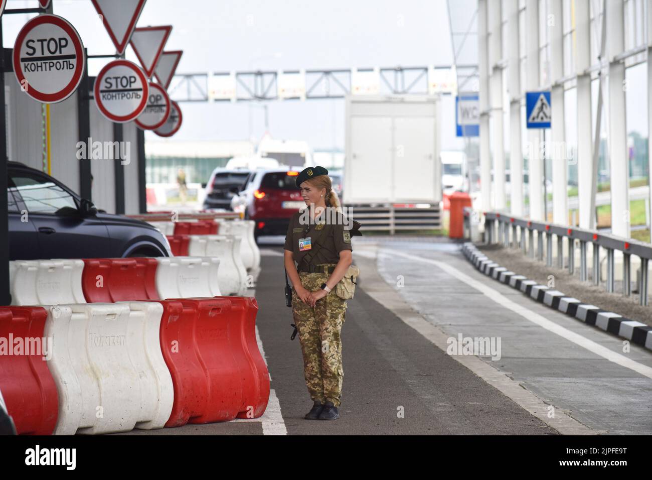 A border guard at the reconstructed checkpoint on the Ukrainian-Polish ...