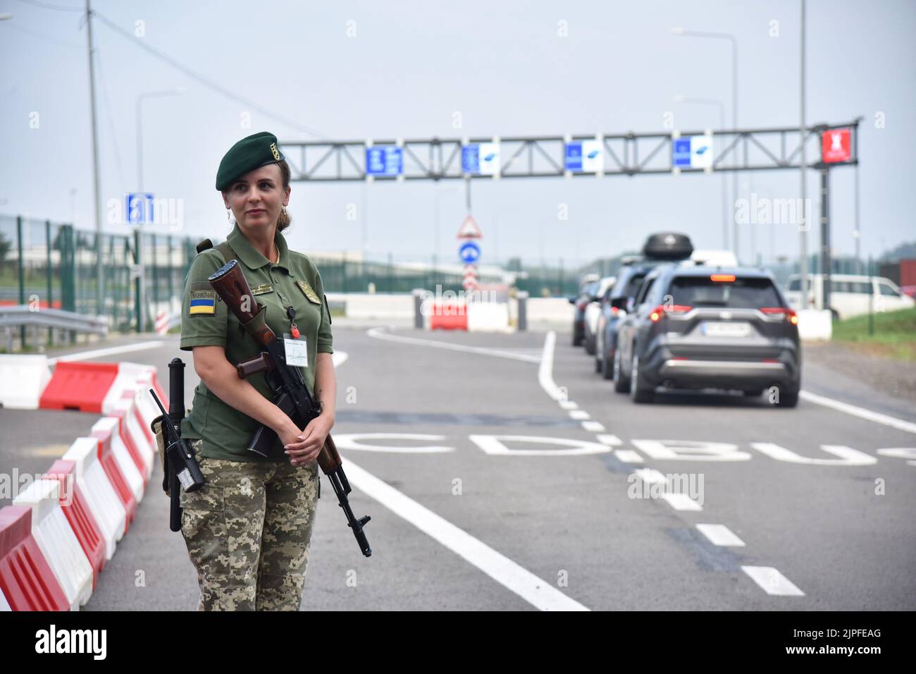 A border guard at the reconstructed checkpoint on the Ukrainian-Polish ...