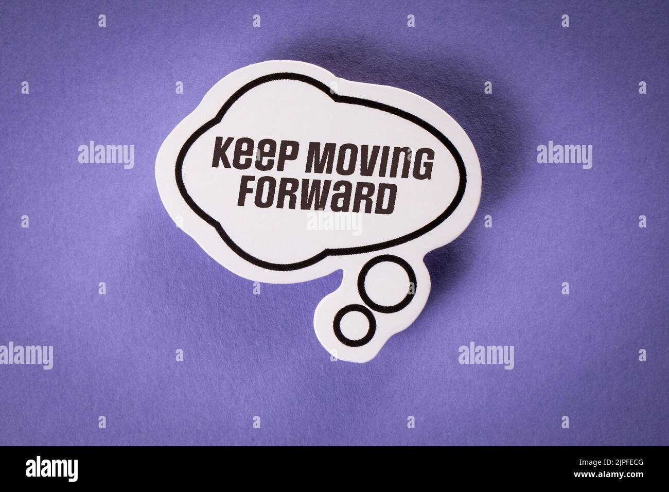 Keep Moving Forward. Text and speech bubble on purple background Stock ...