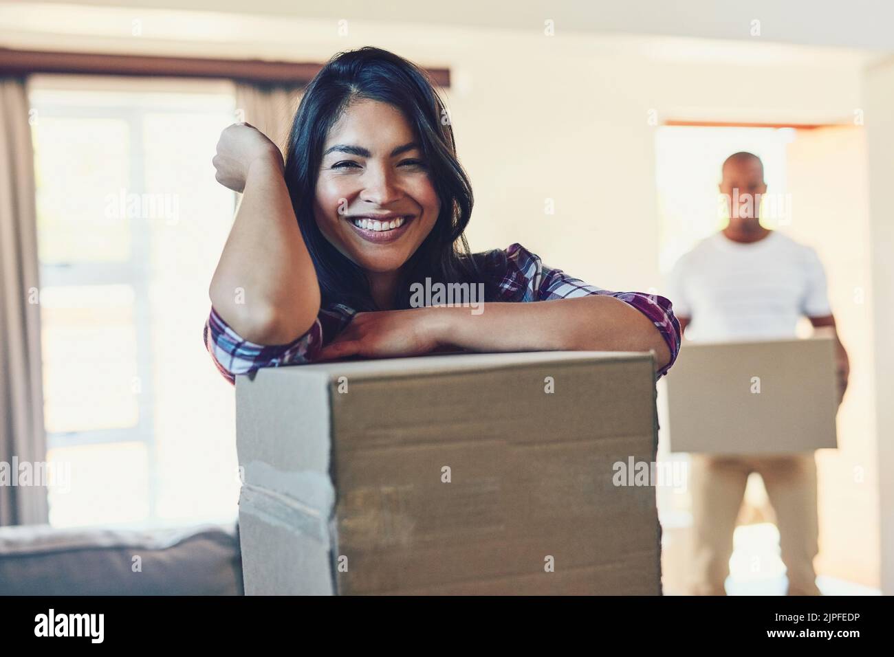 The big move is finally here. Portrait of a young couple moving house Stock Photo - Alamy