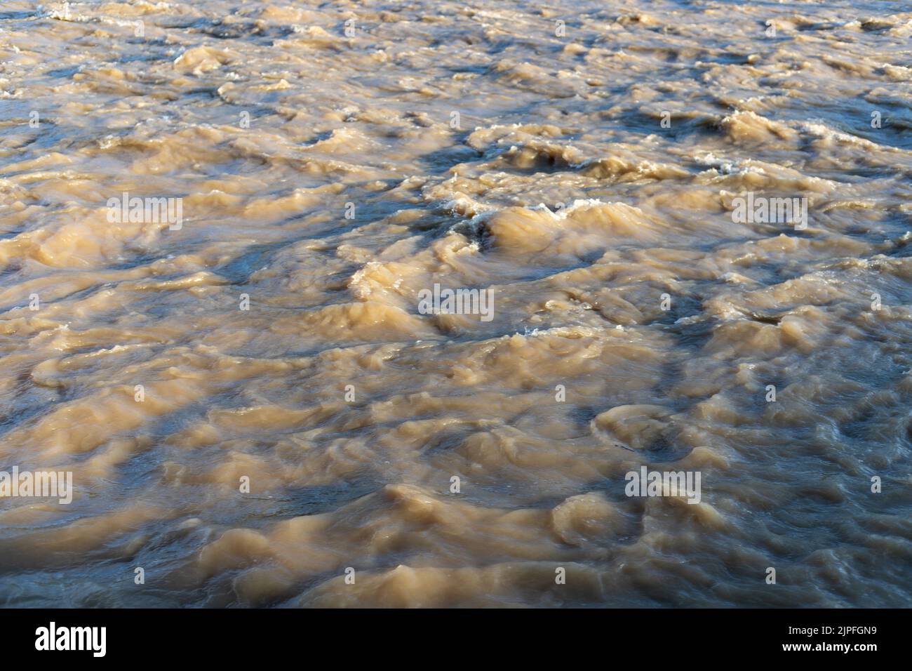 Water flood in the river after heavy rain in the valley Stock Photo - Alamy