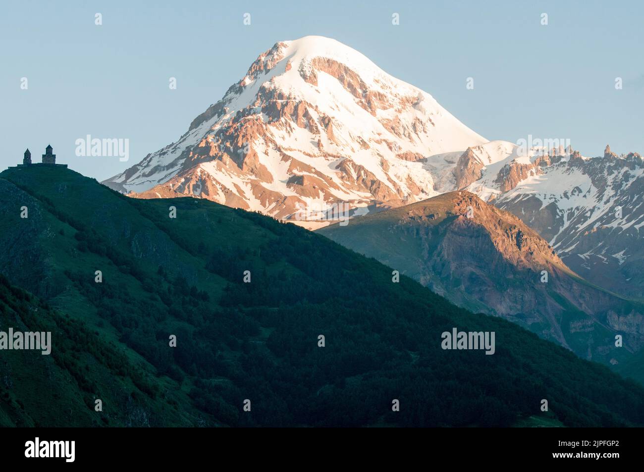 Gergeti Trinity Church below Mt Kazbeg in the High Caucasus of Georgia ...
