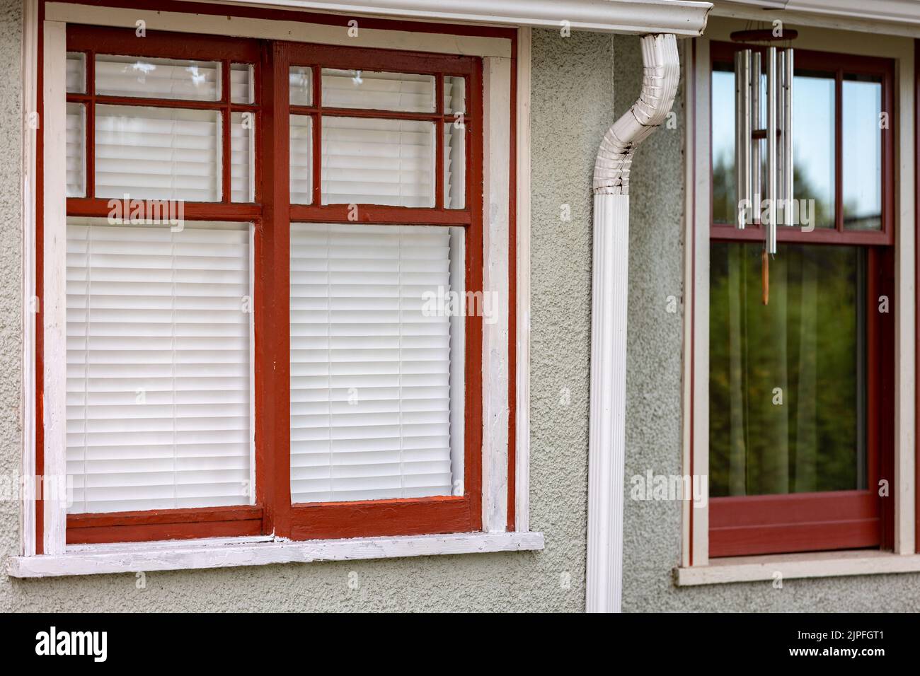 A red and white window frames on a house Stock Photo - Alamy