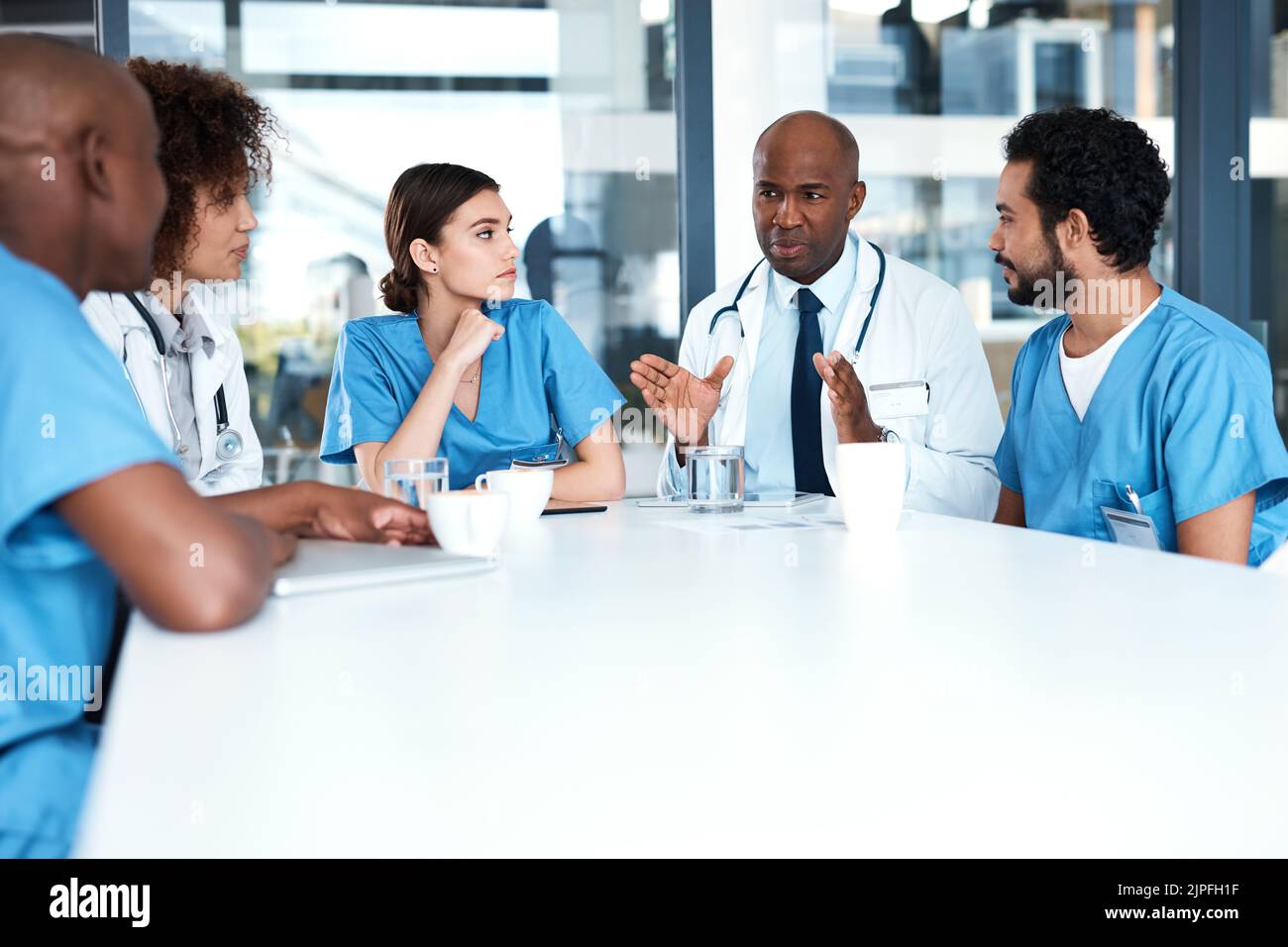 Planning the way forward. a group of medical practitioners having a ...