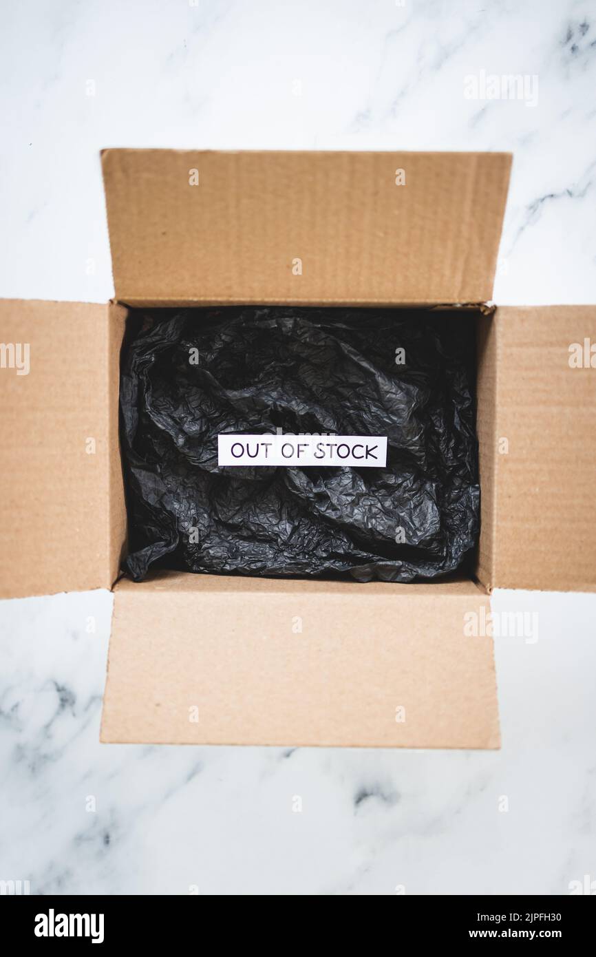 Out of stock text inside of empty delivery parcel with black padding on ...