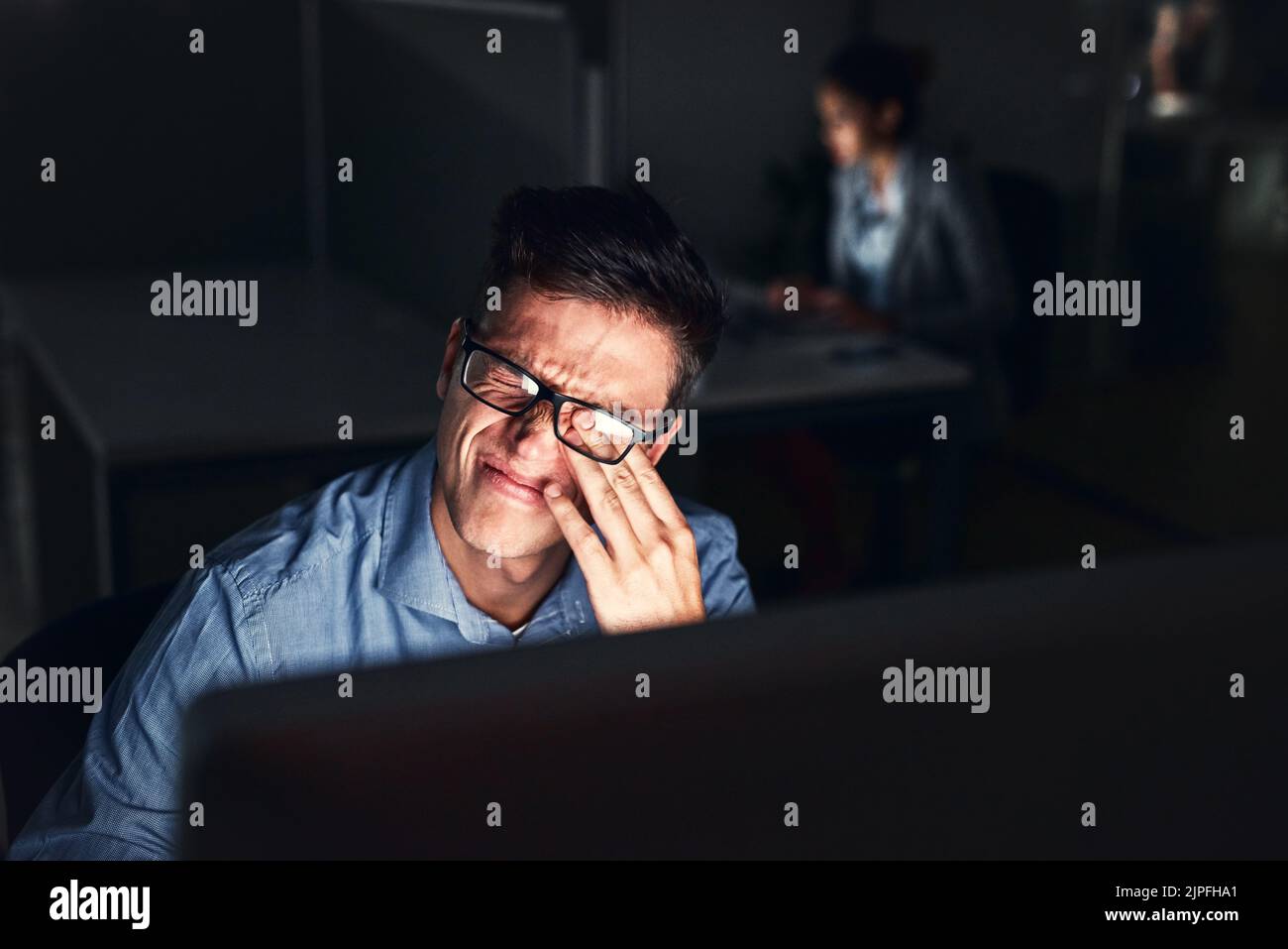 How did it get so late. a young attractive businessman working late in ...