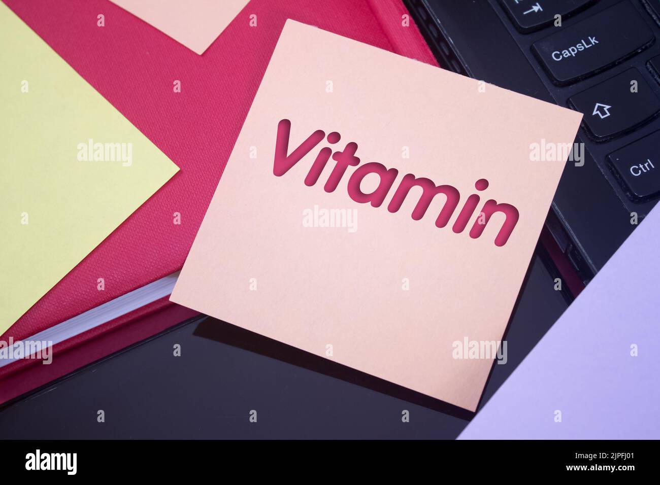 Vitamin. Text on adhesive note paper. Event, celebration reminder ...