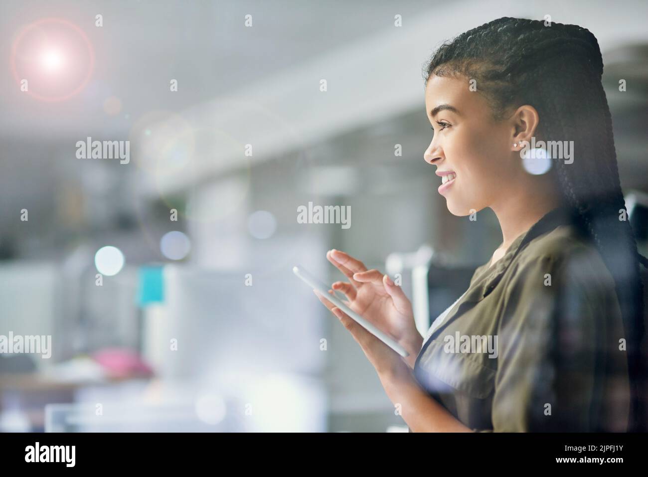 Business is picking up, I must record it on my tablet. a young ...