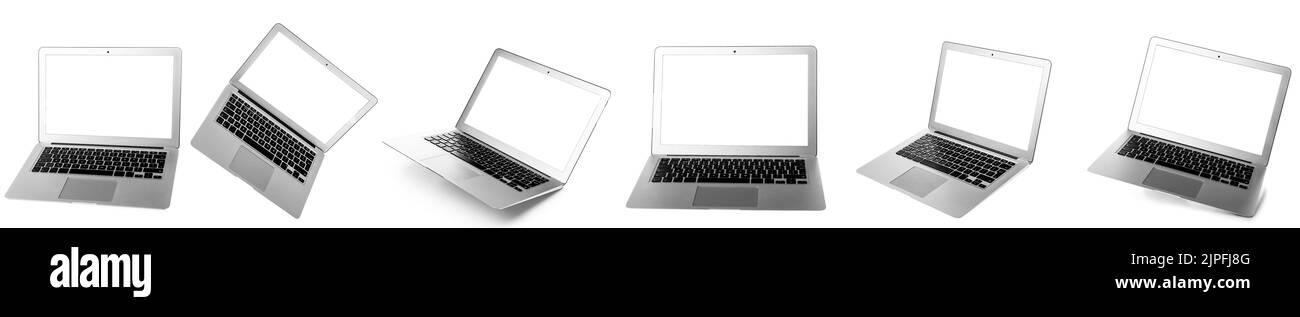 Set of modern laptops isolated on white Stock Photo - Alamy