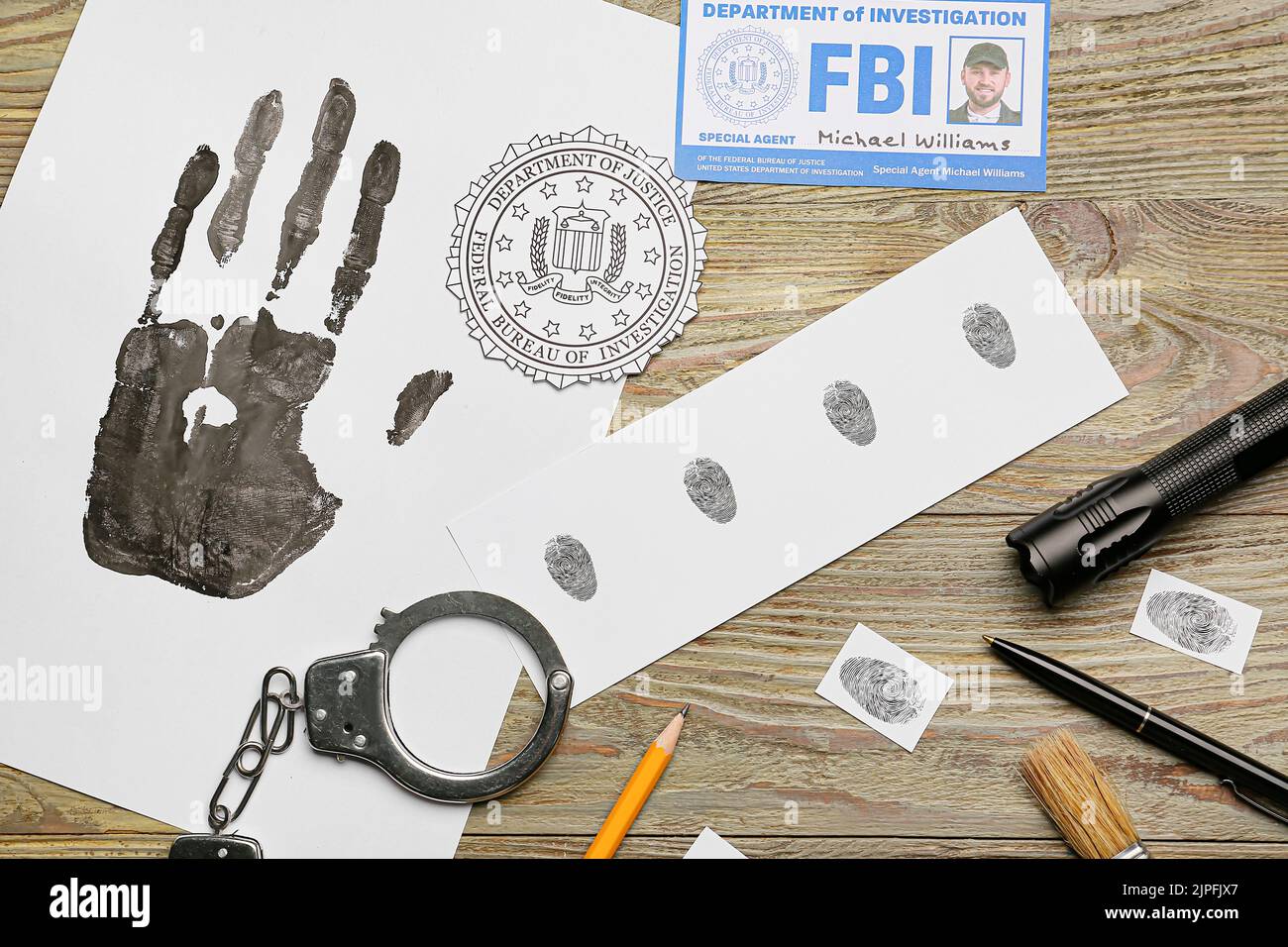 Paper sheets with different prints, document of FBI agent and ...