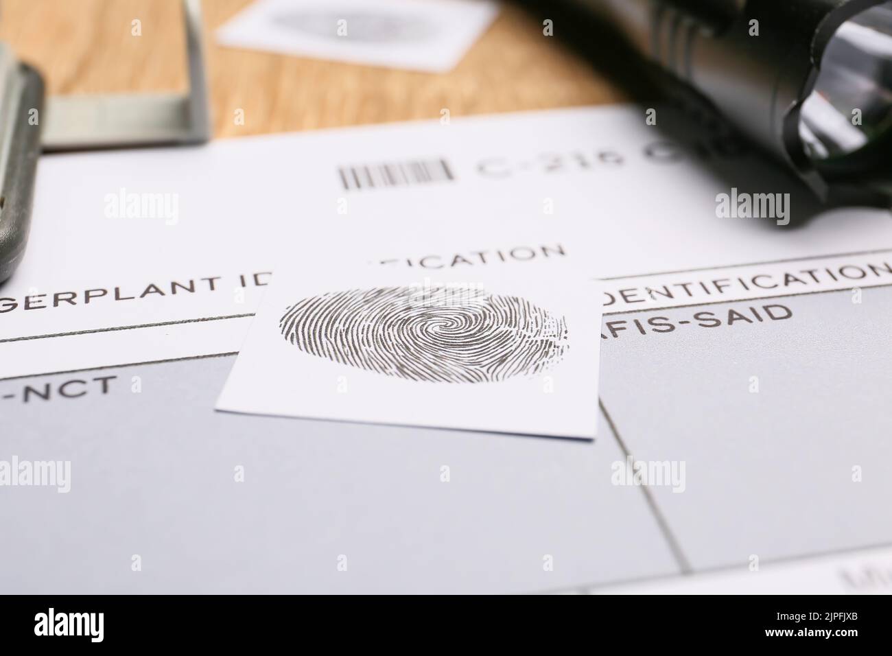 Paper sheet with finger print, closeup Stock Photo - Alamy