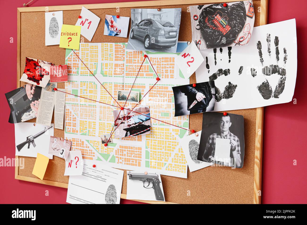 Crime board hanging on color wall in FBI agent's office Stock Photo - Alamy