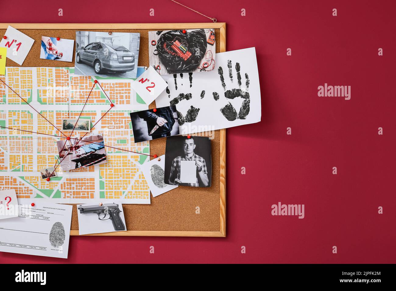 Crime board hanging on color wall in FBI agent's office Stock Photo - Alamy