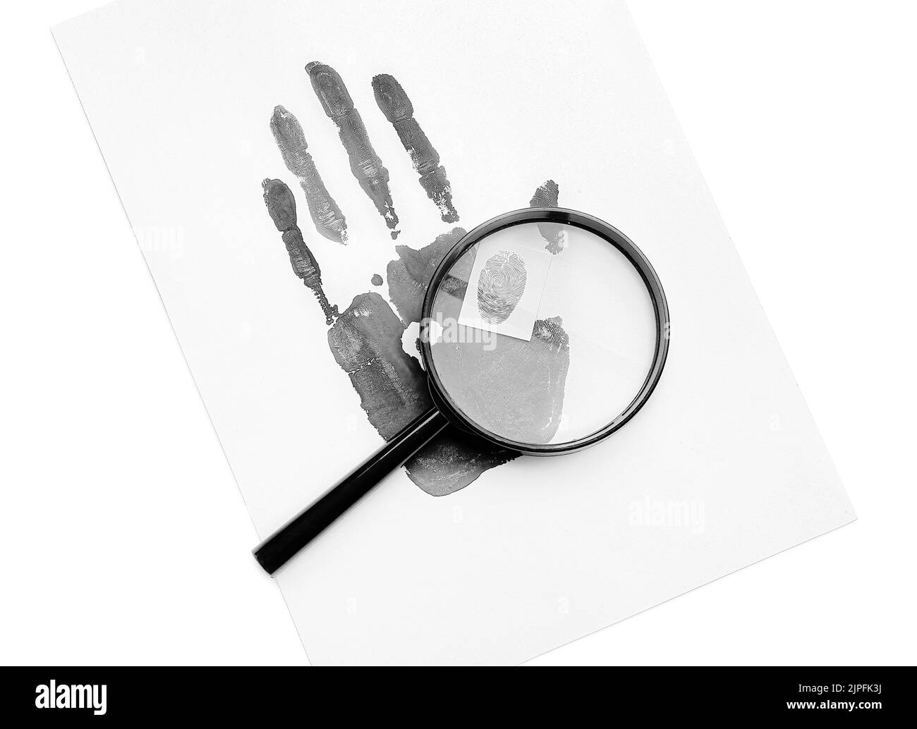Magnifier and paper sheet with palm and finger prints on white ...