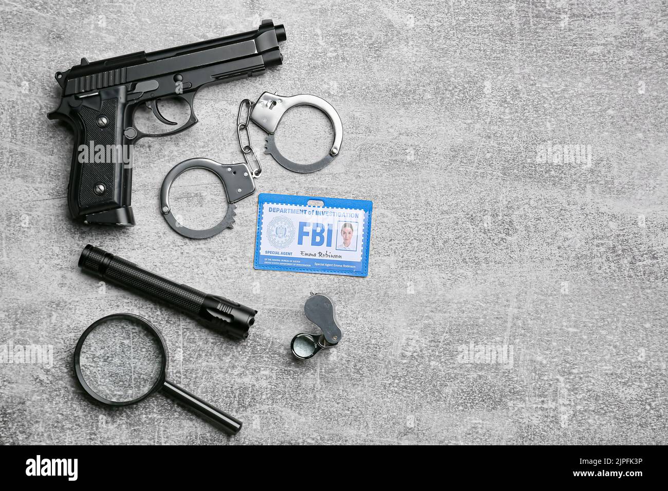 Identification document of FBI agent and accessories on grunge ...