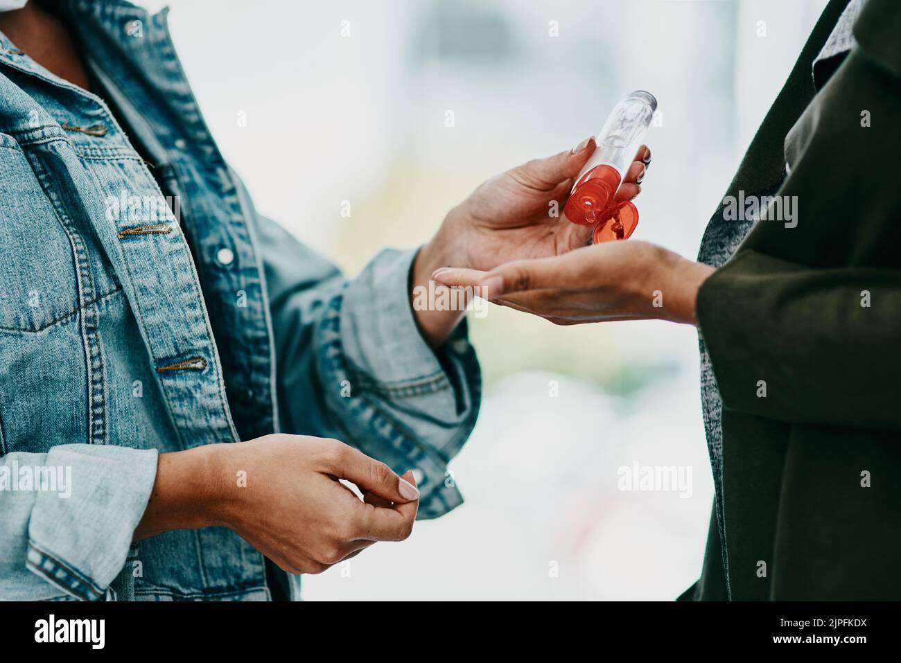 Hygiene, covid and cleaning with healthy woman applying hand sanitizer ...