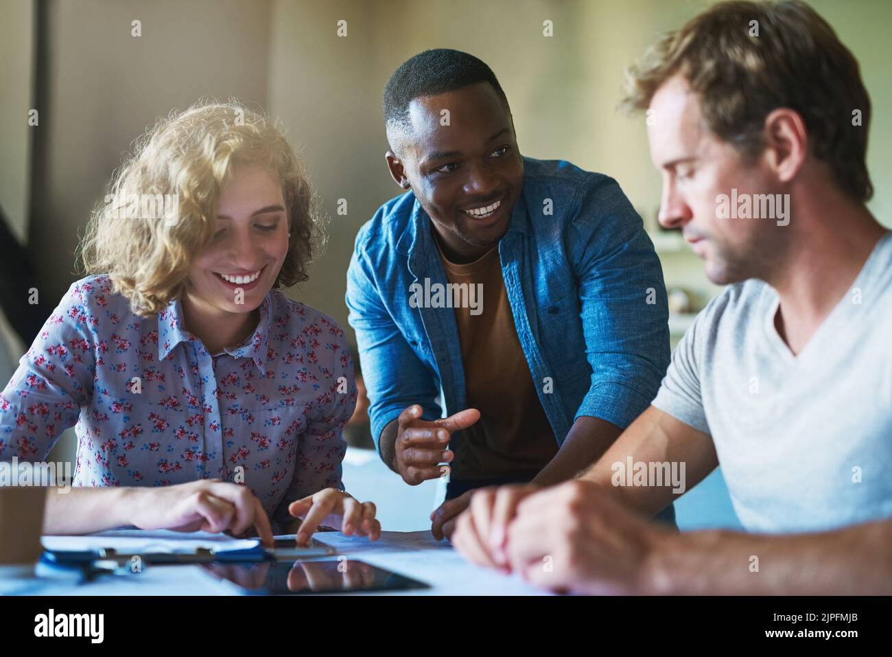 How a mobile app is born. a diverse group of businesspeople ...