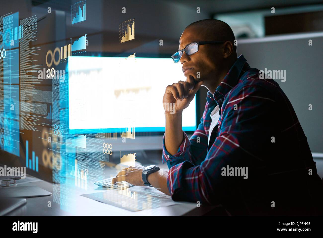 The code requires thought. a young male programmer working on computer ...