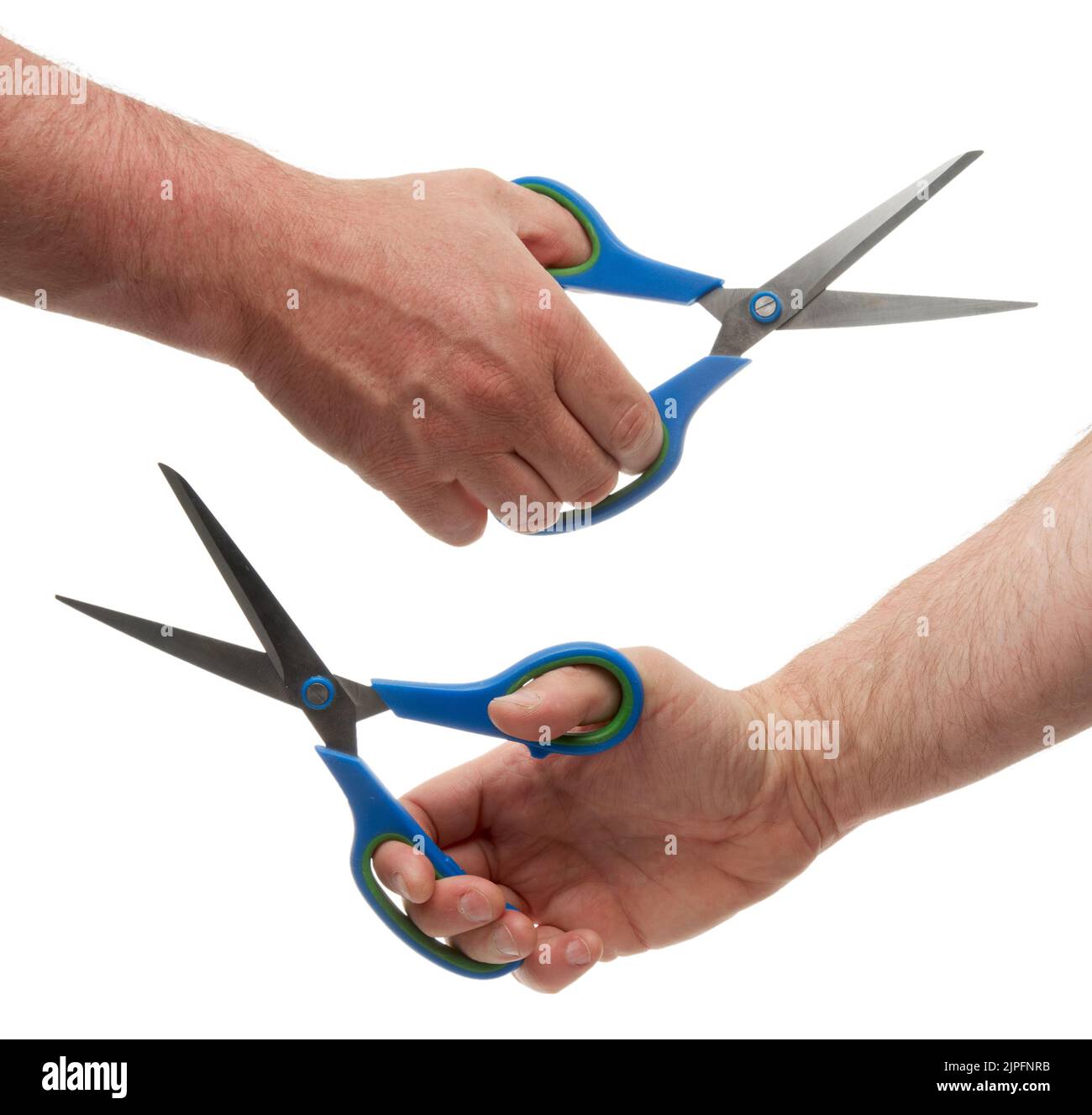 Hand with metal scissors with blue plastic handles. Isolated on white ...