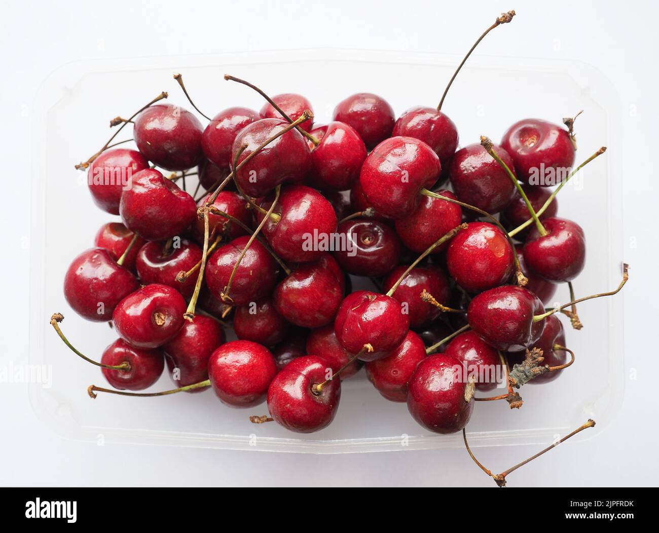red cherry scientific name Prunum vegetarian fruit food Stock Photo - Alamy