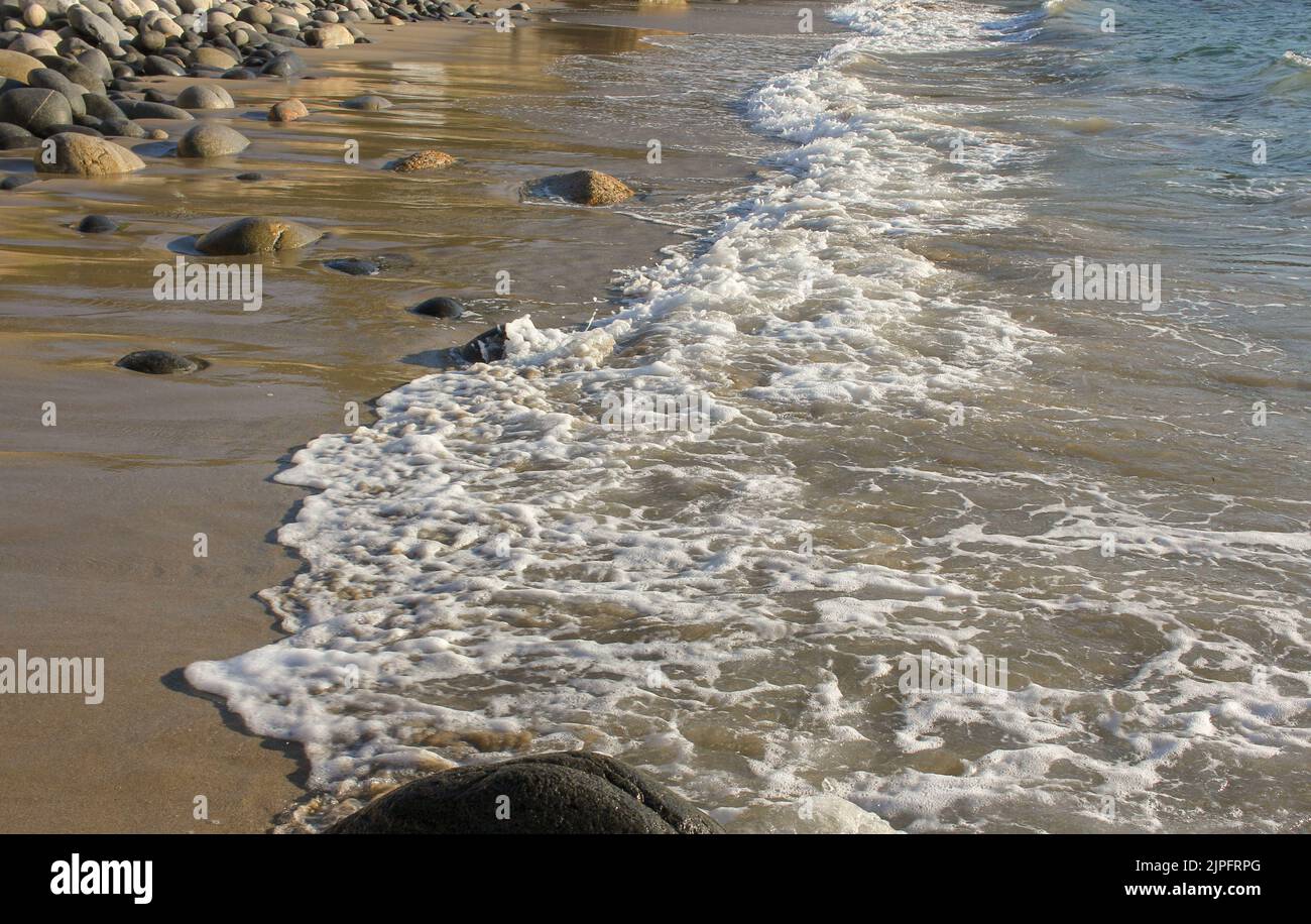 the relaxing sound of waves of cold water kissing the coast Stock Photo ...
