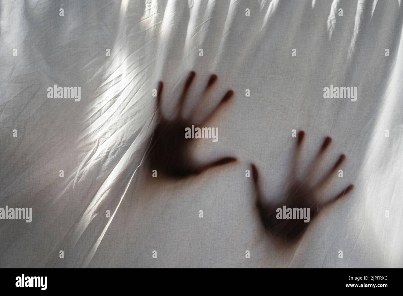 Hide behind your hands hi-res stock photography and images - Alamy
