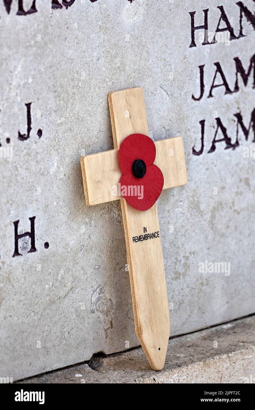 YPRES, BELGIUM - AUGUST 10, 2022: Closeup of poppy cross beside names ...