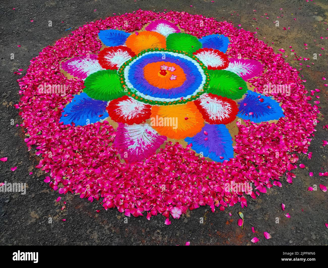 A Beautiful Indian Village Flowers And Colour Mix Rangoli Designs Photo ...