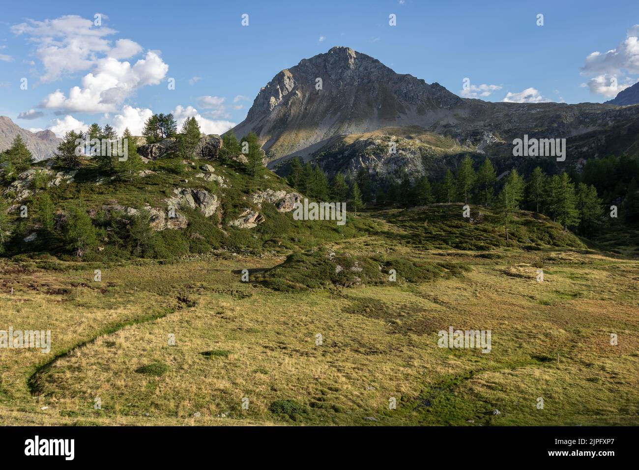 traveling in switzerland, landscapes with rocky mountains, azure lakes ...